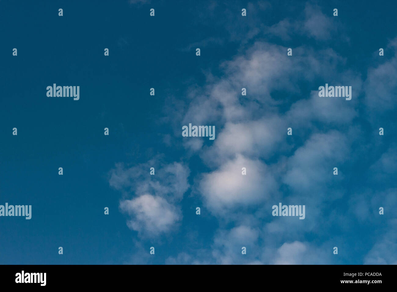 Textures of clouds, clear sky Stock Photo - Alamy