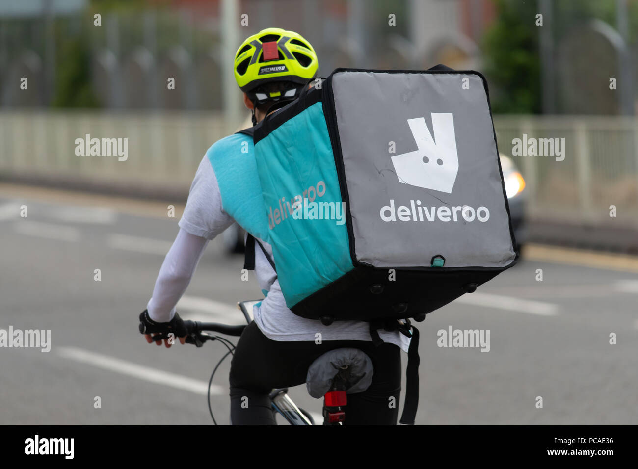 A Deliveroo fast food delivery driver seen on a push bike in Cardiff ...