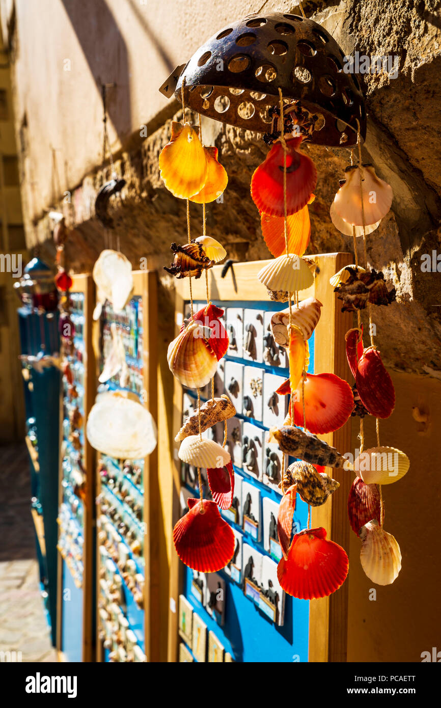 Colourful souvenirs and sea shells for sale in Crete, Greek Islands ...
