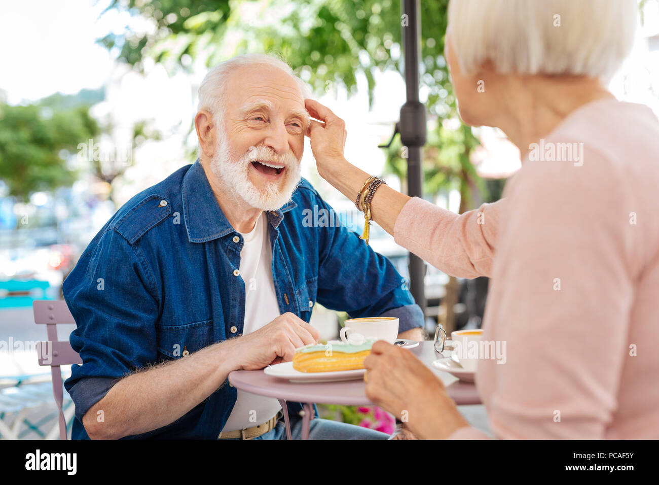 Exuberant senior man making laugh Stock Photo - Alamy