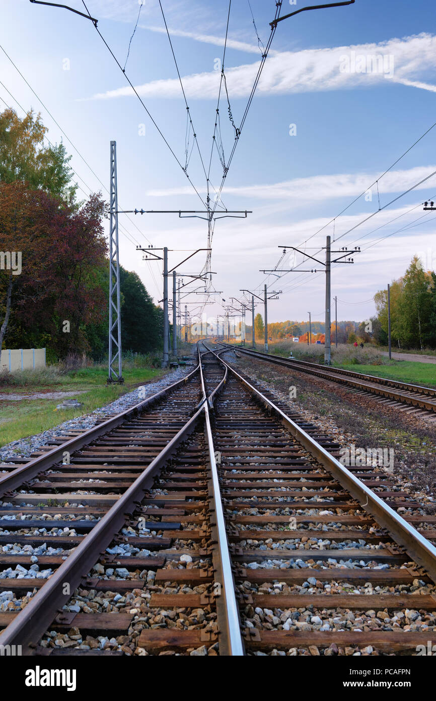 The rails and wires on poles railroad perspective to the horizon with ...