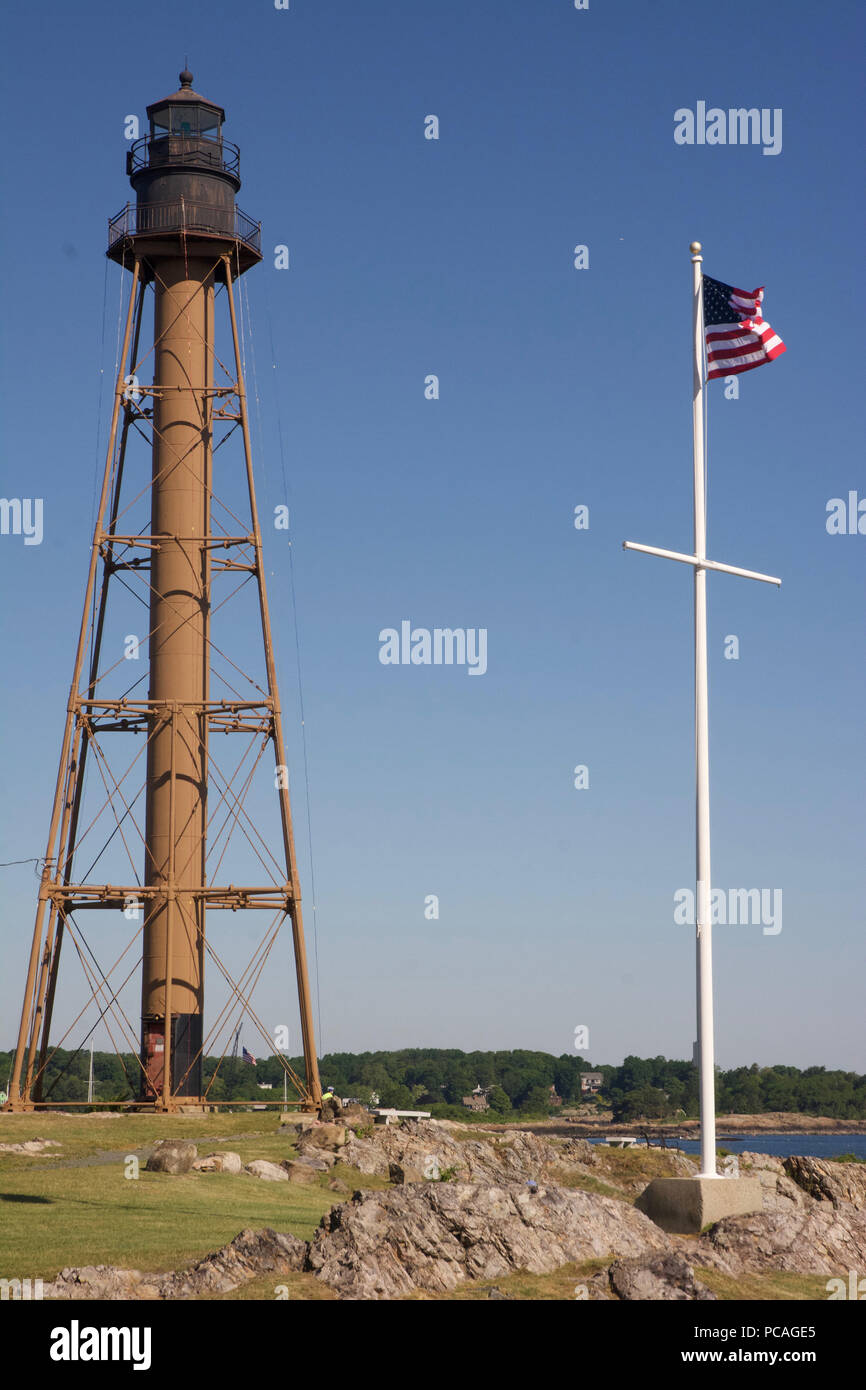 This iconic lighthouse is viewed from a great distance in the ocean ...