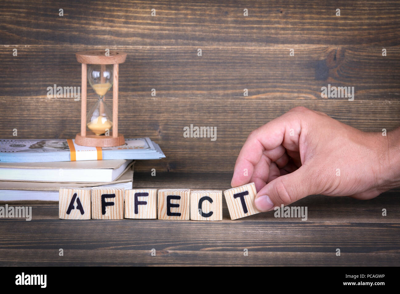 affect. wooden letters on the office desk Stock Photo - Alamy