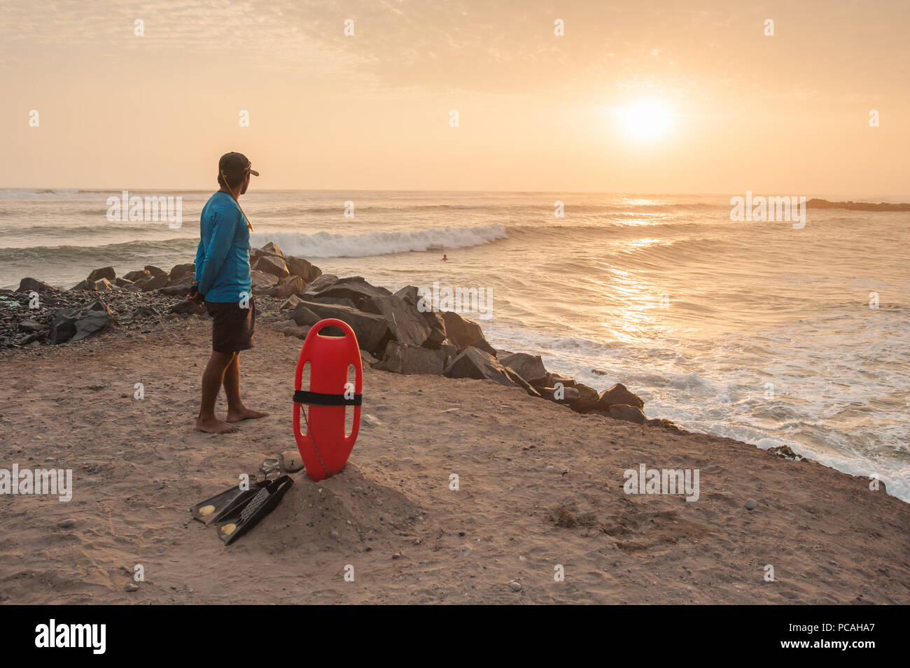 Red lifeguard float on beach hi-res stock photography and images - Alamy