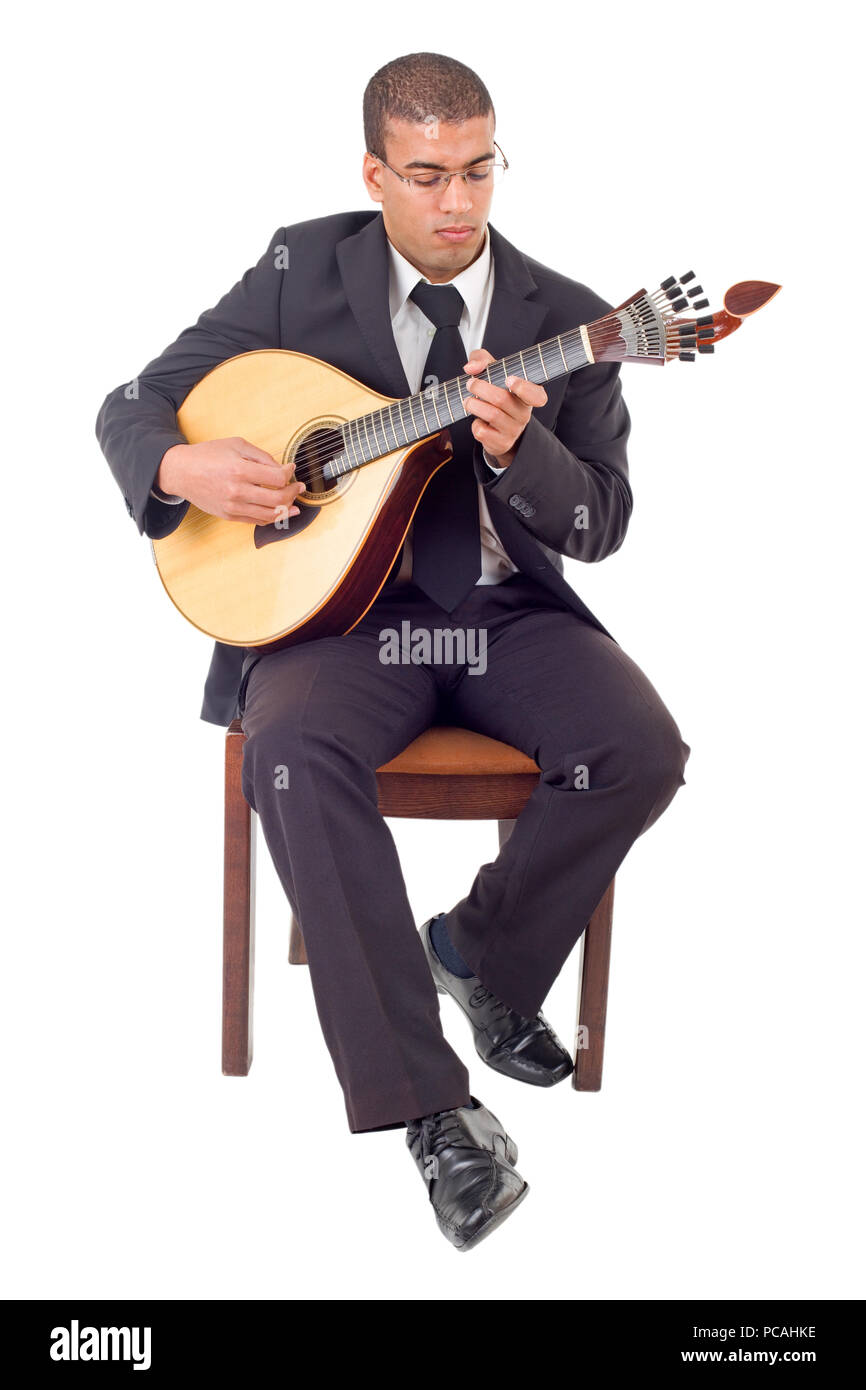 man playing a portuguese guitar, full length, isolated Stock Photo - Alamy