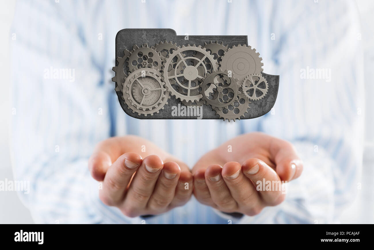 Business hand holding gear mechanism hi-res stock photography and ...
