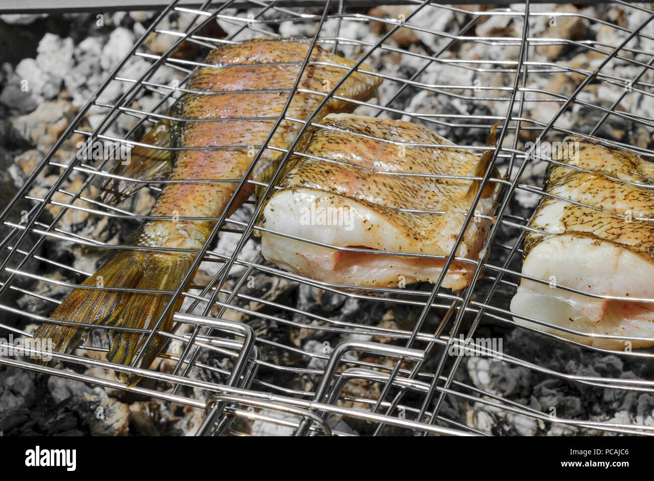 Barbecue fish holder hi-res stock photography and images - Alamy