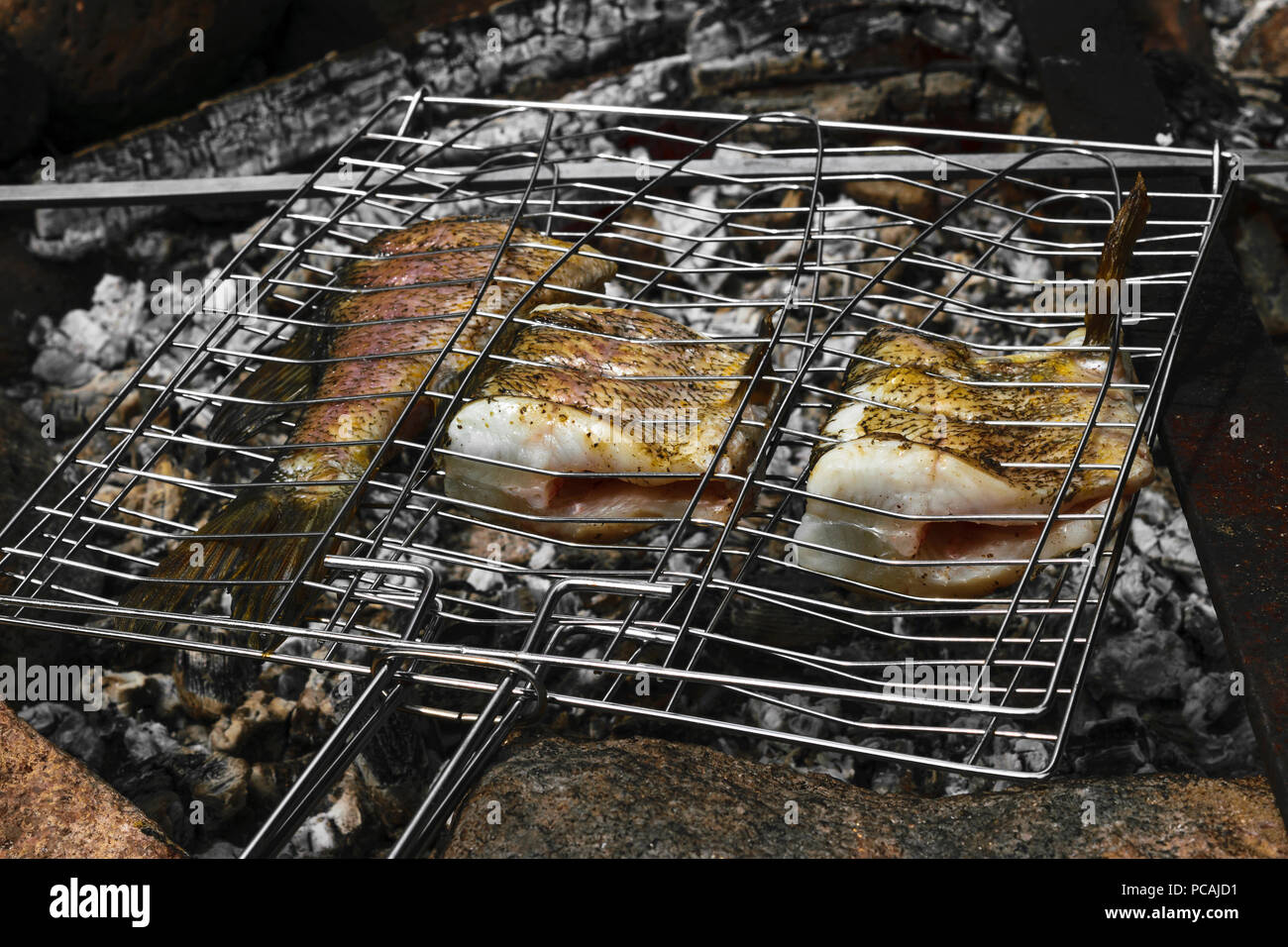 Barbecue fish holder hi-res stock photography and images - Alamy