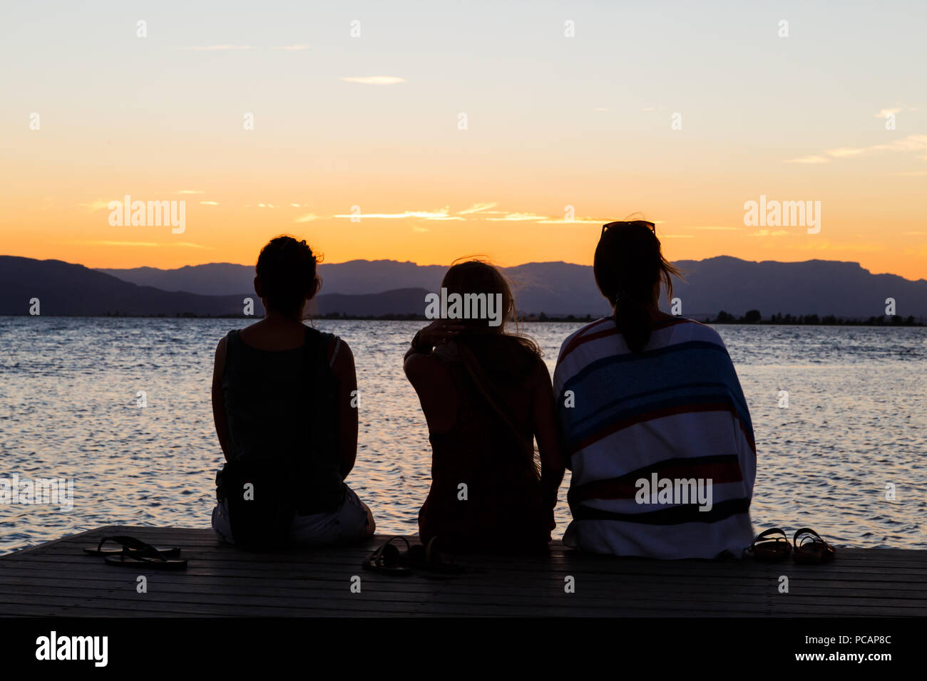 Couple watching sunset, car hi-res stock photography and images - Alamy