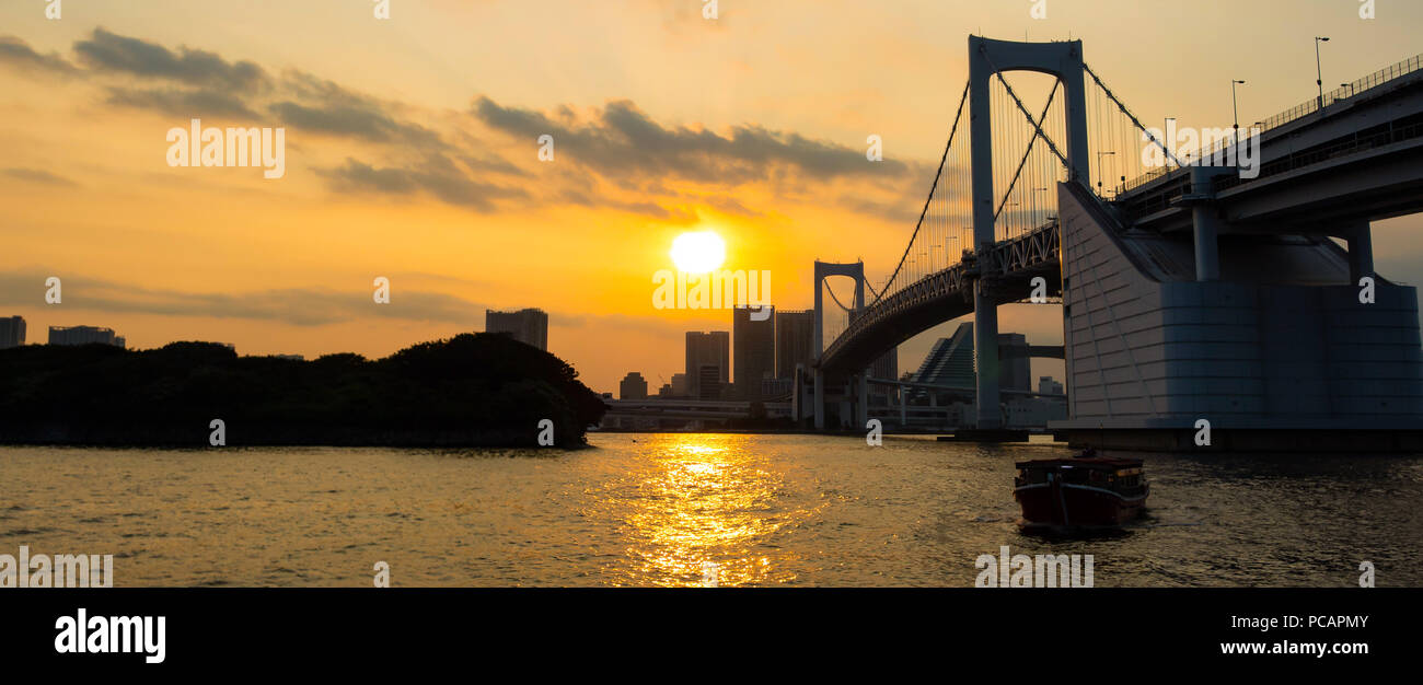 Sunset moment at Tokyo rainbow bridge, Odaiba, Tokyo, Japan Stock Photo ...