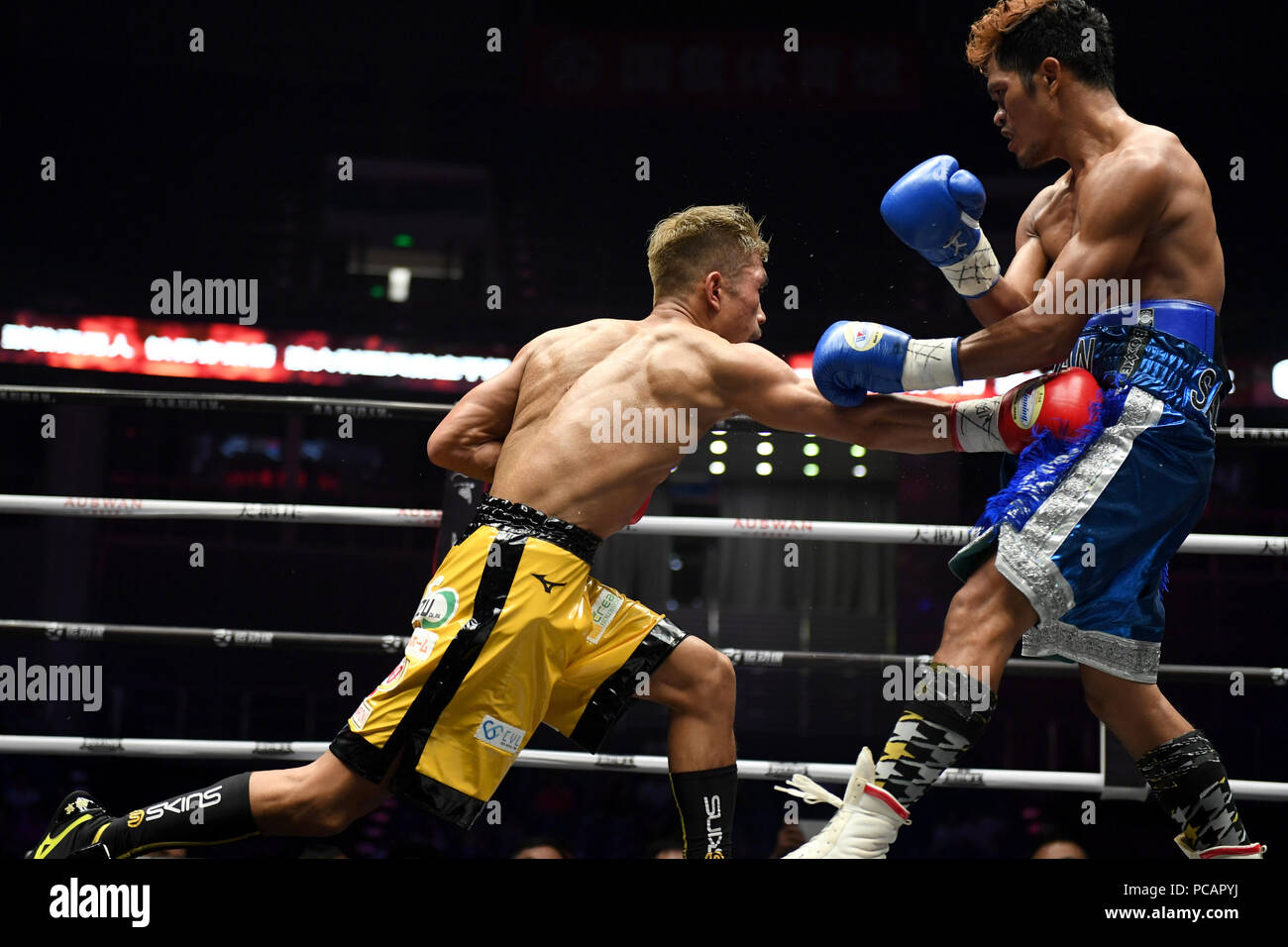 Qingdao, China. 31st July, 2018. Japanese boxer Sho Kimura Sho defeats ...
