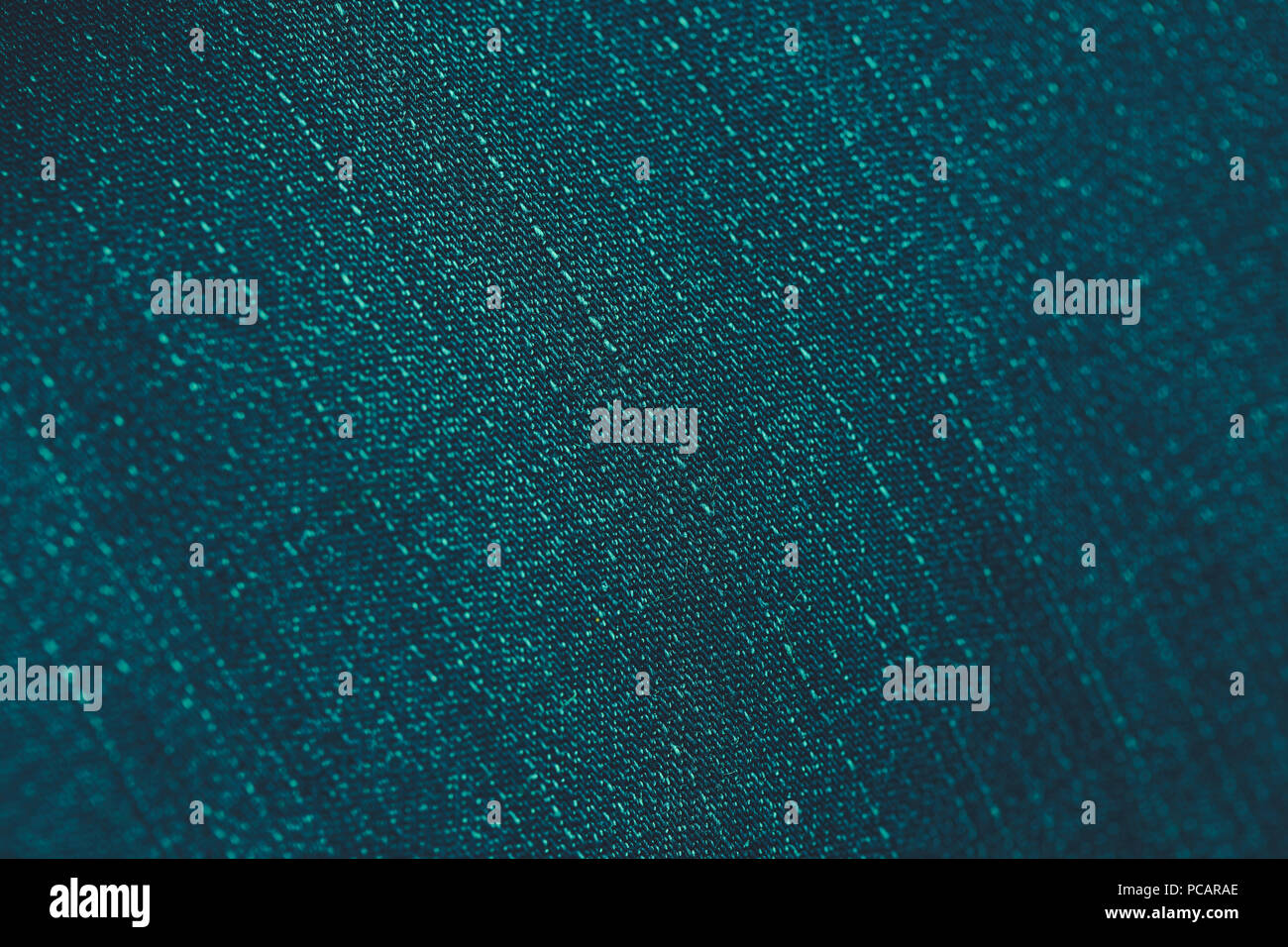 Teal jean denim fabric texture background, vintage toned, closeup Stock ...