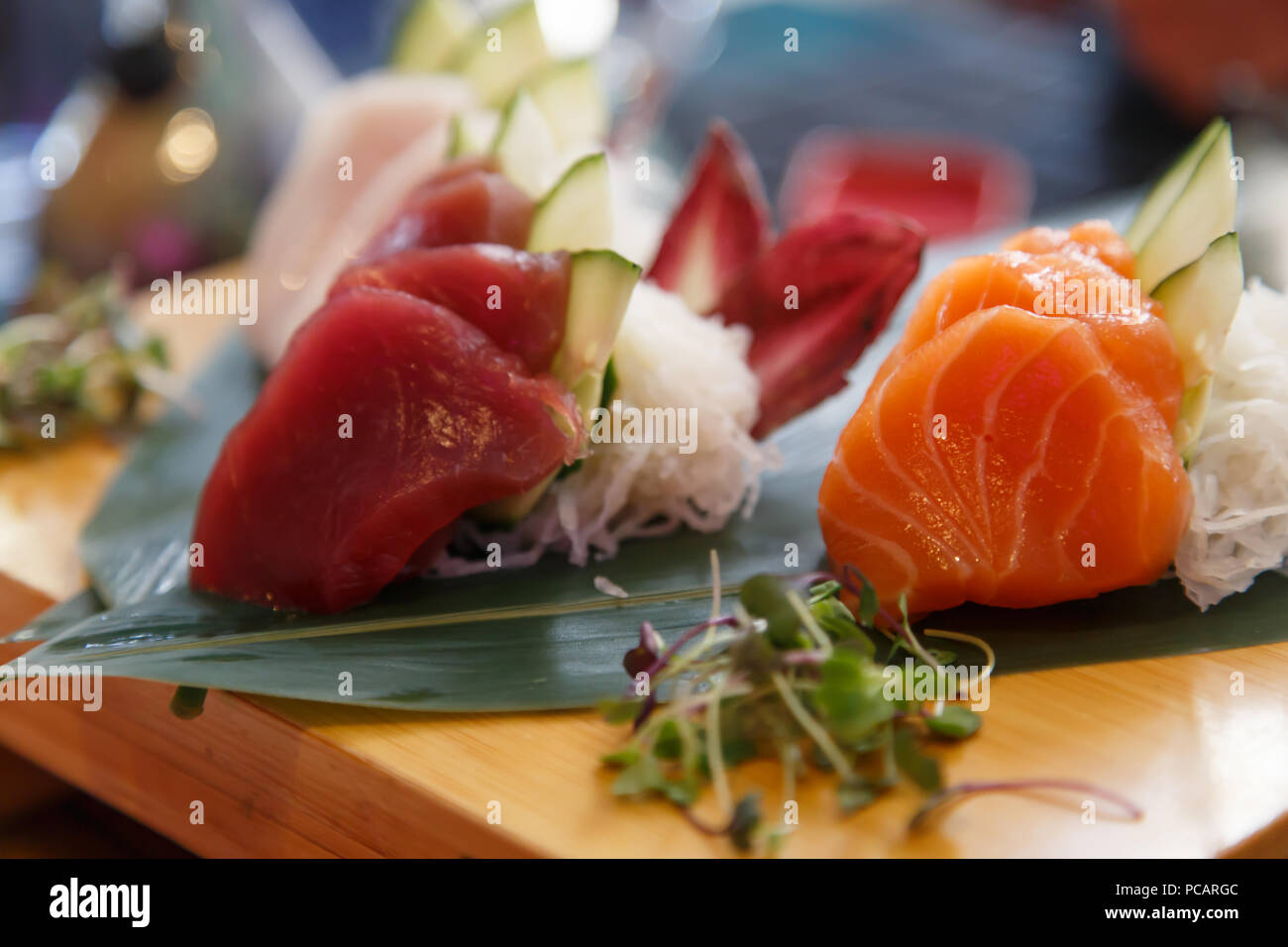 Hirame sashimi,salmon sashimi and tuna sashimi dish Stock Photo - Alamy