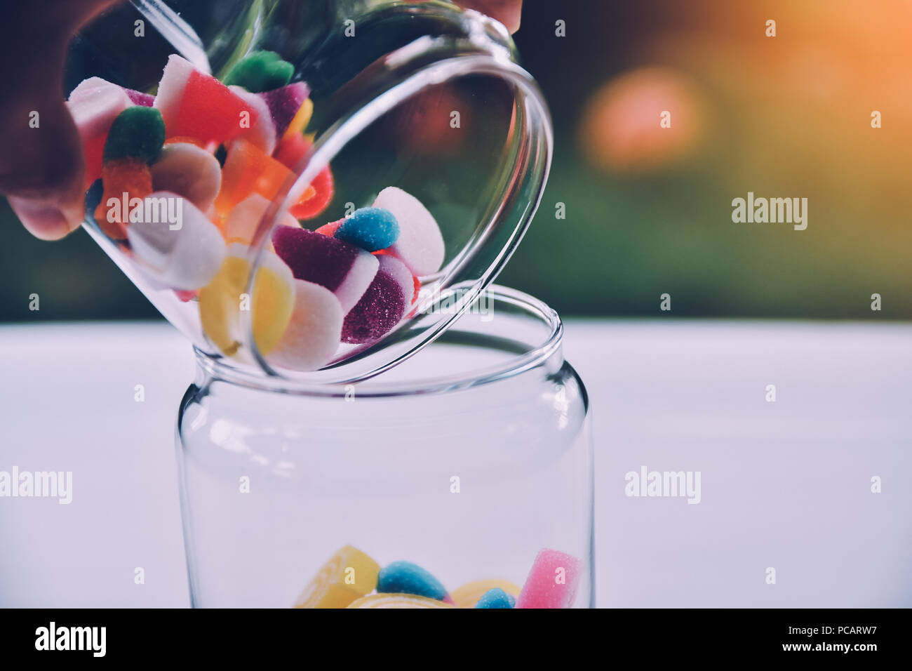 Sweet Jelly Beautiful color in glass bottles Stock Photo - Alamy