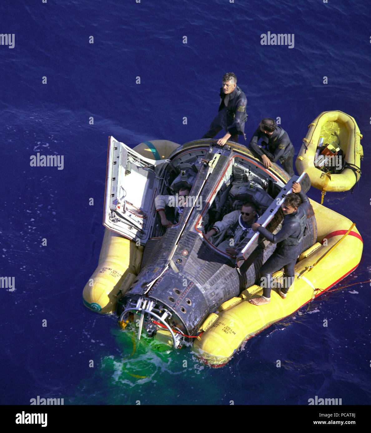 Astronauts Neil A. Armstrong and David R. Scott while awaiting the ...