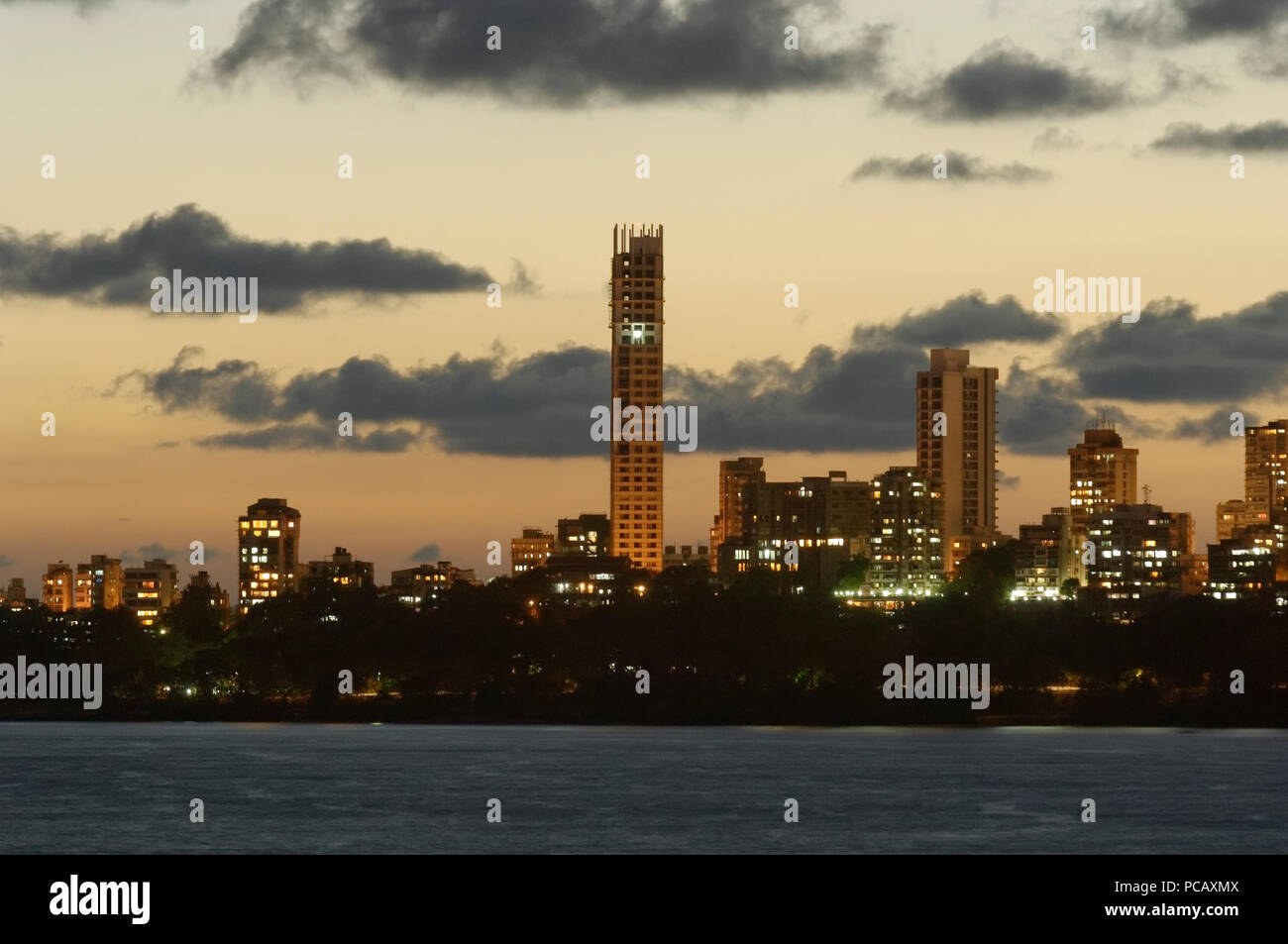 Mumbai Skyline showing Walkeshwar after sunset from Marine Drive ...
