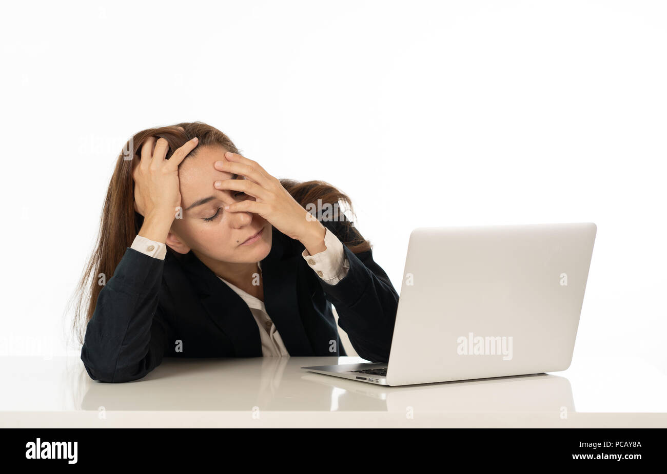 Young beautiful business woman suffering stress working at office ...