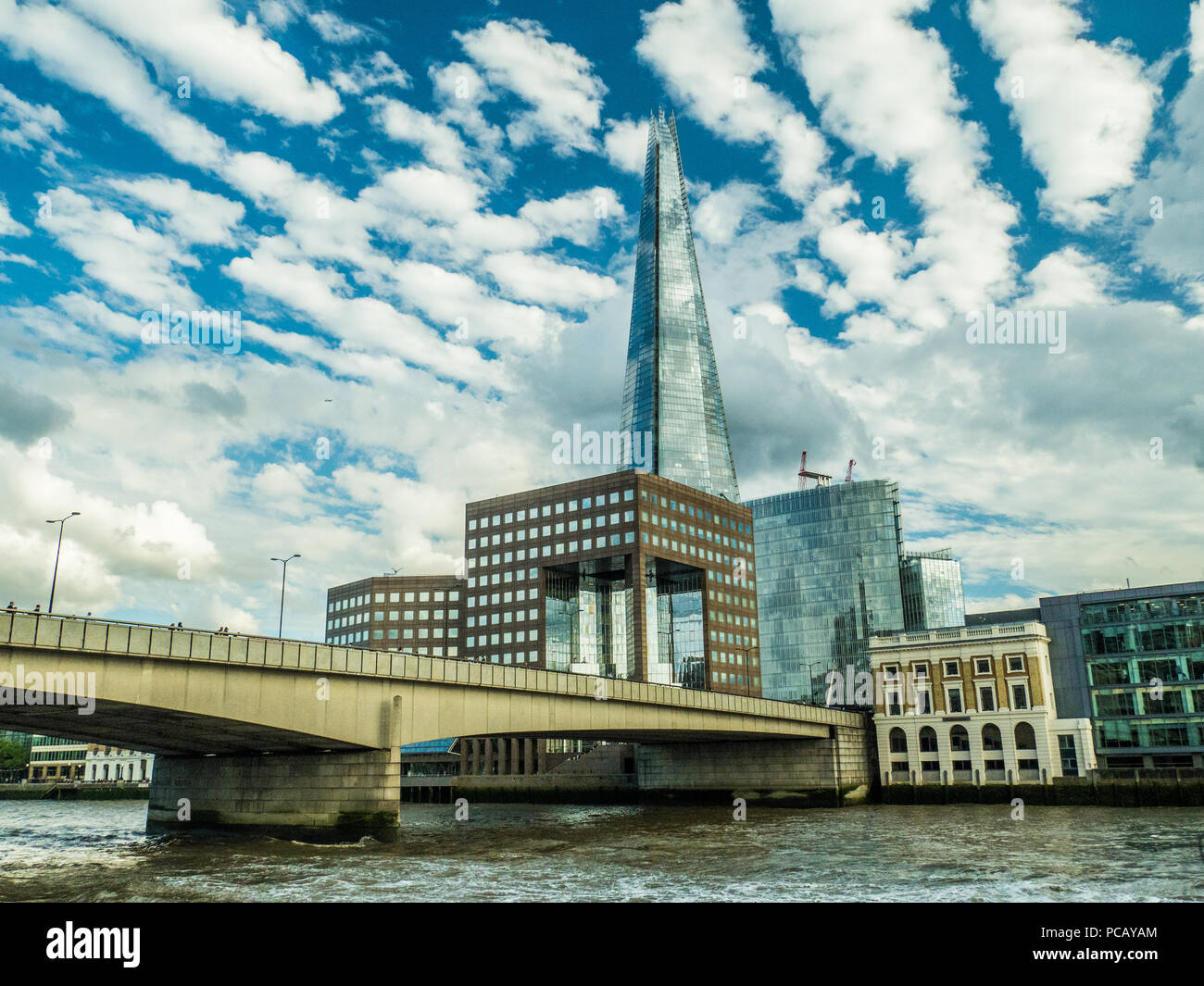 London Bridge over the River Thames with The Shard behind, London ...