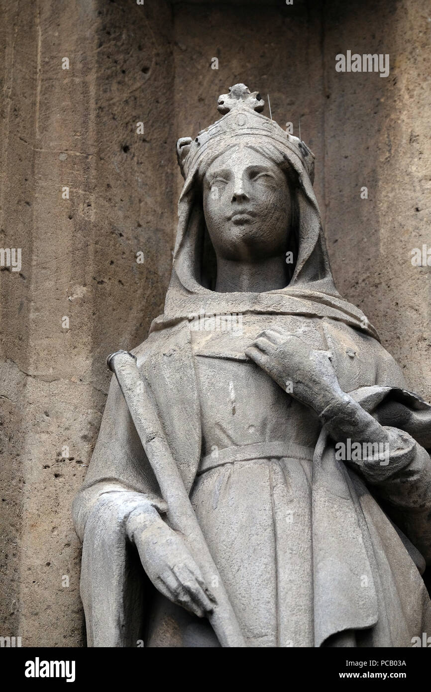 Saint Bathilde statue on the portal of the Saint Germain l'Auxerrois ...