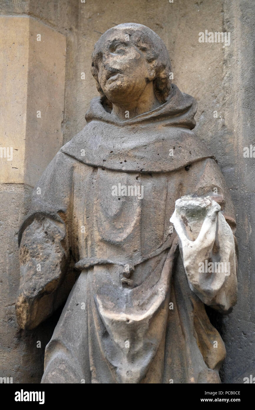 Statue of Saint on the portal of the Saint Germain l'Auxerrois church ...