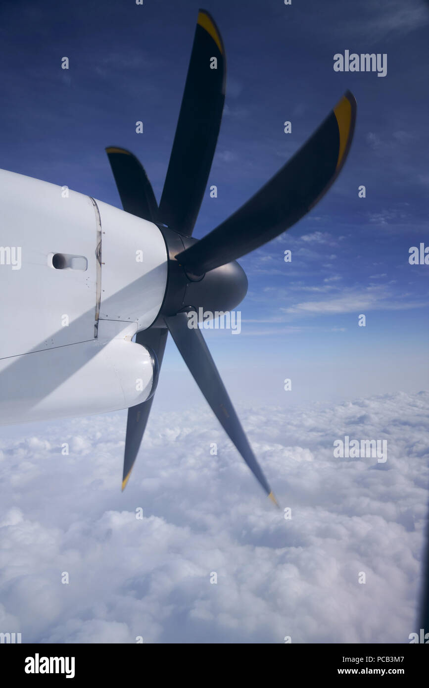 Propeller Airplane and Cloud Stock Photo - Alamy