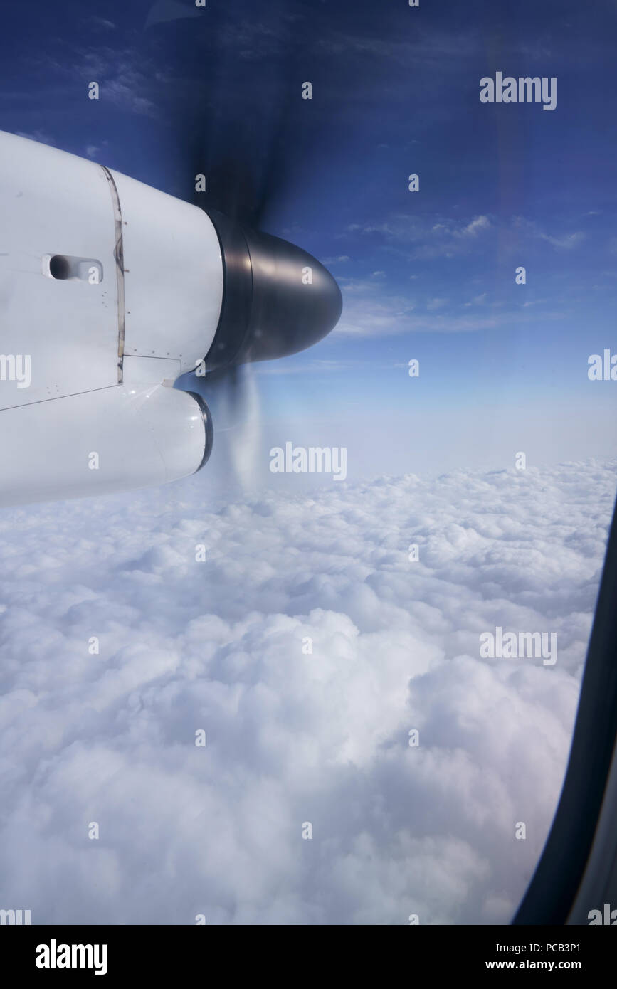 Propeller Airplane and Cloud Stock Photo - Alamy
