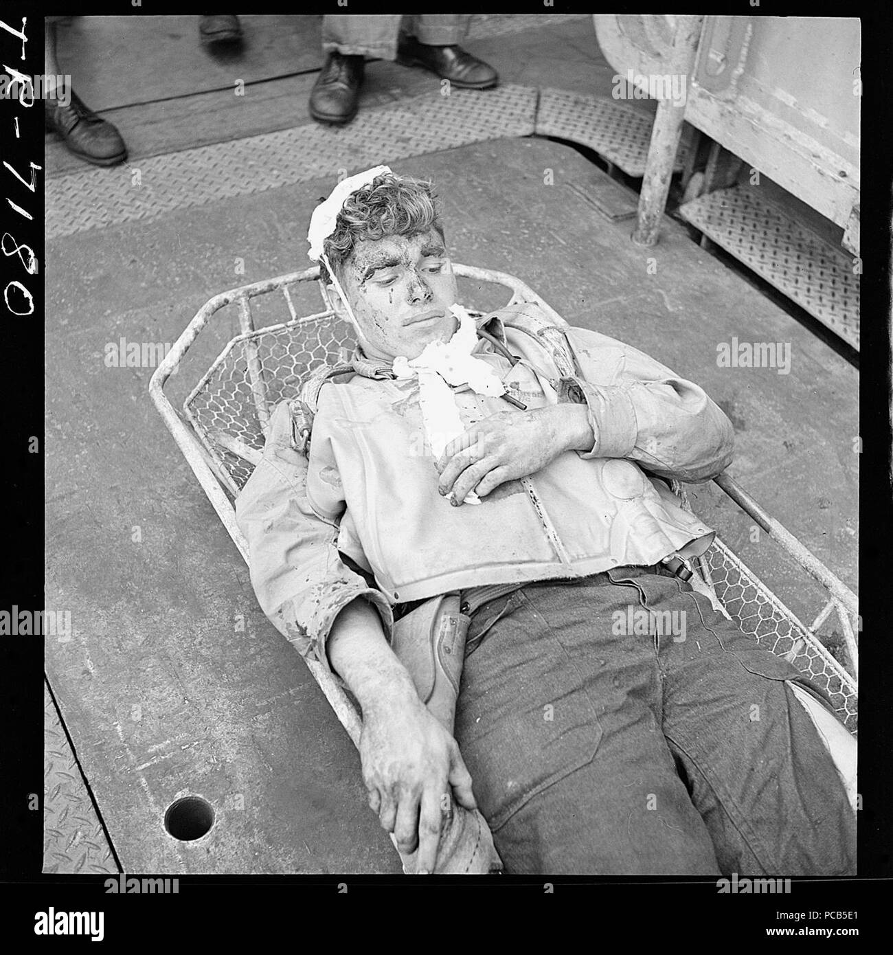 Aircrewman, wounded during raid on Rabaul, on board the USS Saratoga ...