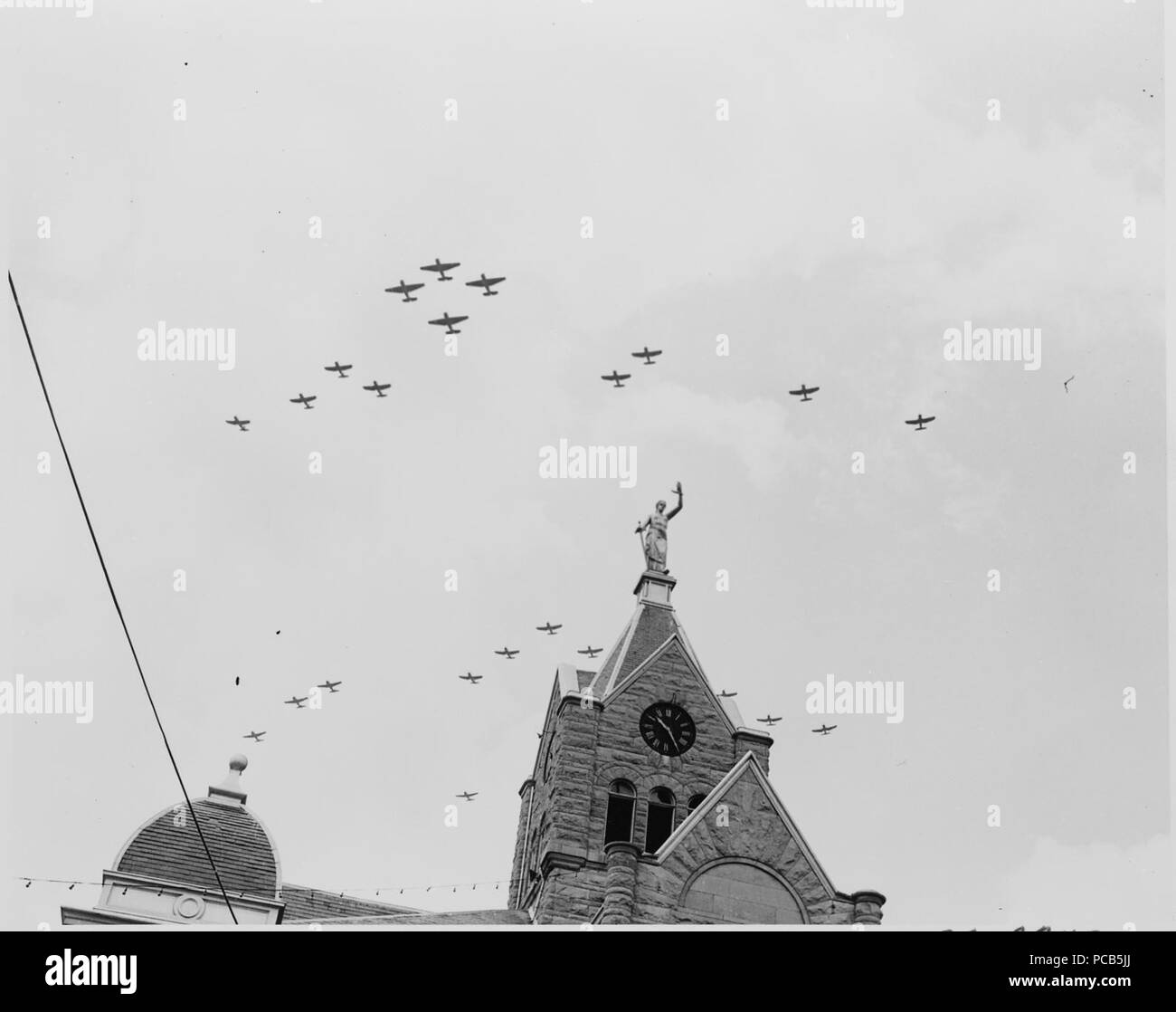 Airplanes passing over the county court house in Bolivar, Missouri ...