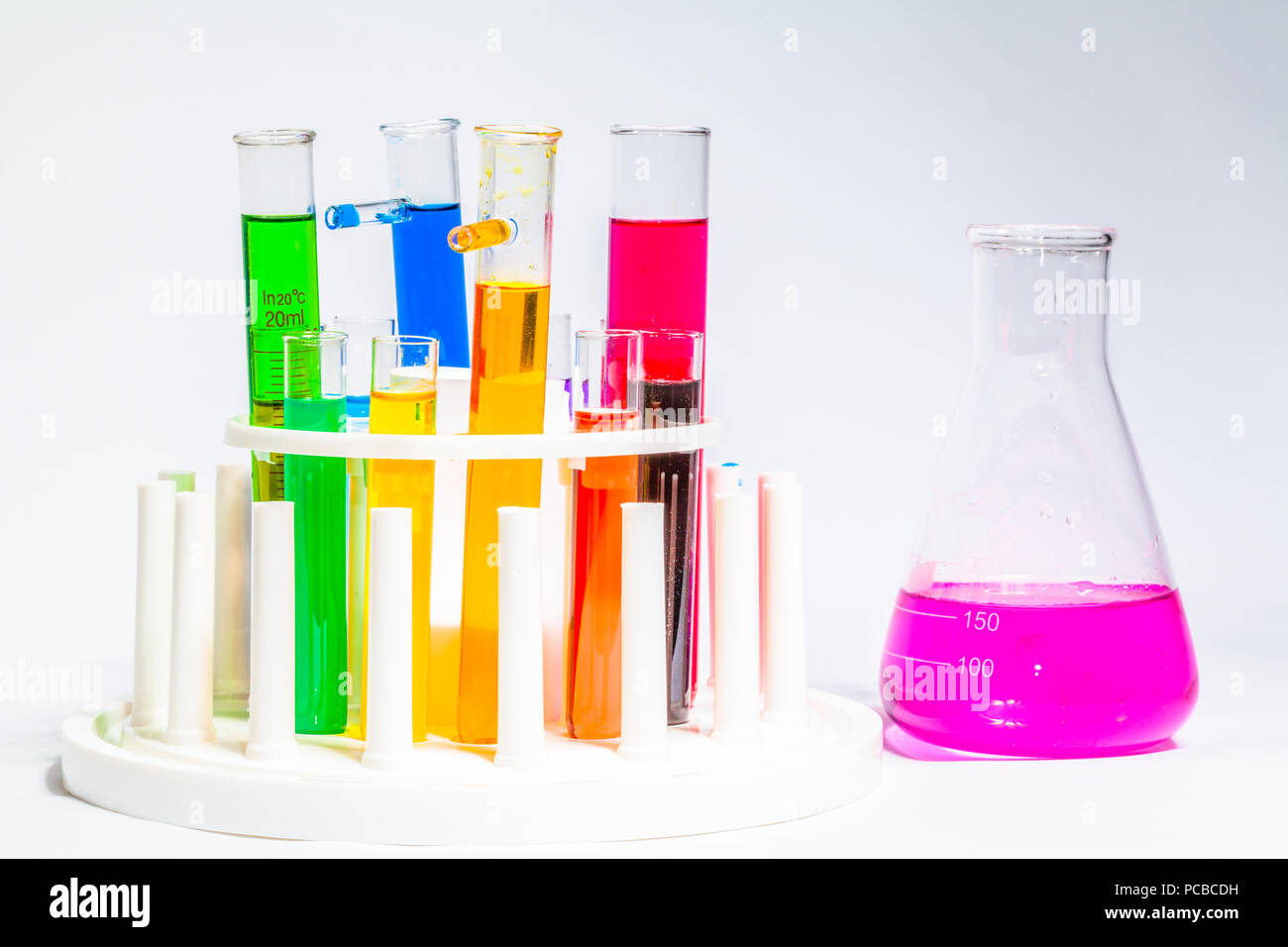 Experiments in mixing chemical substances into glass tubes with a ...