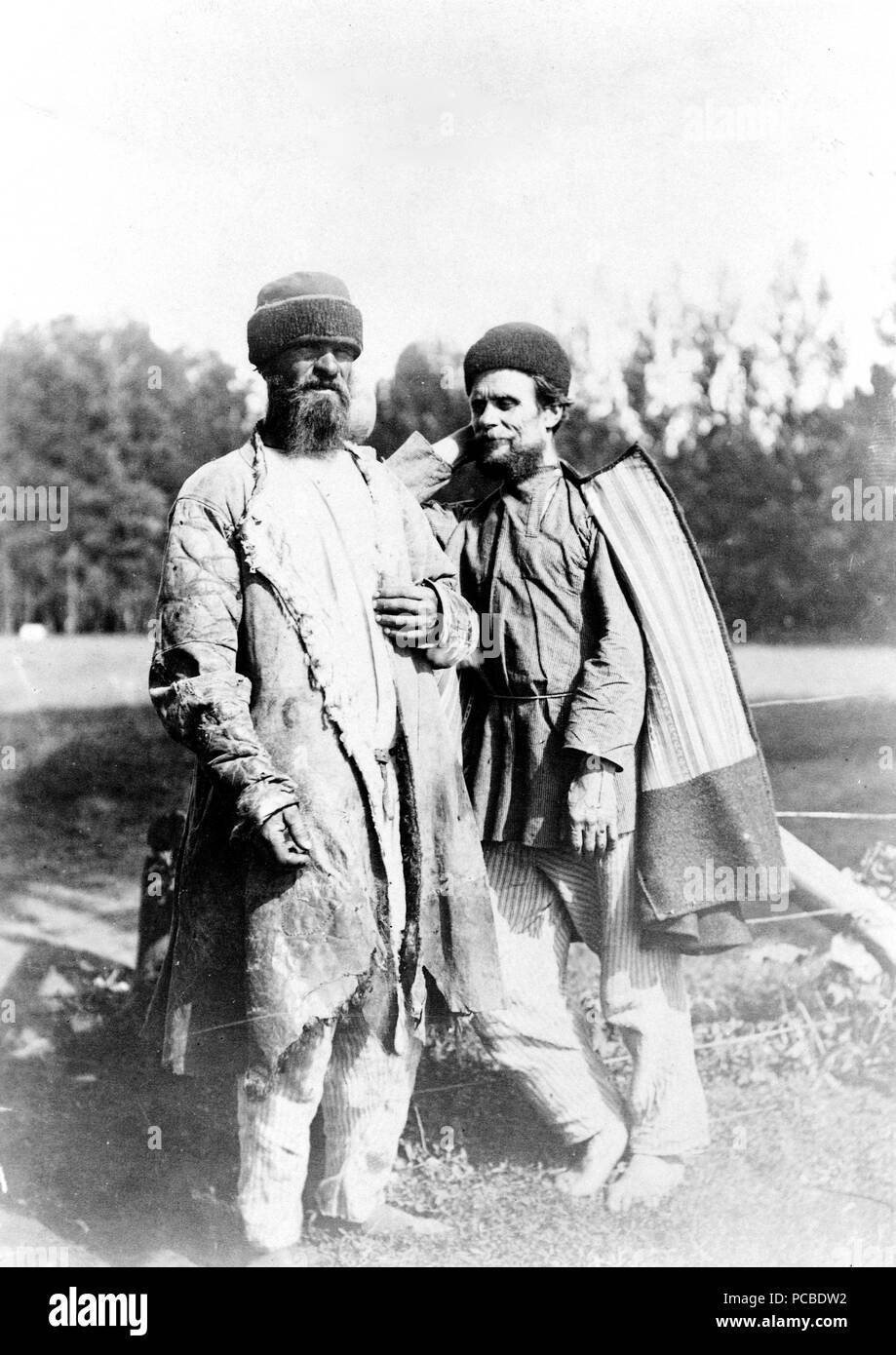 Two men standing, outdoors, full-length, Russia 1880-1924 Stock Photo ...