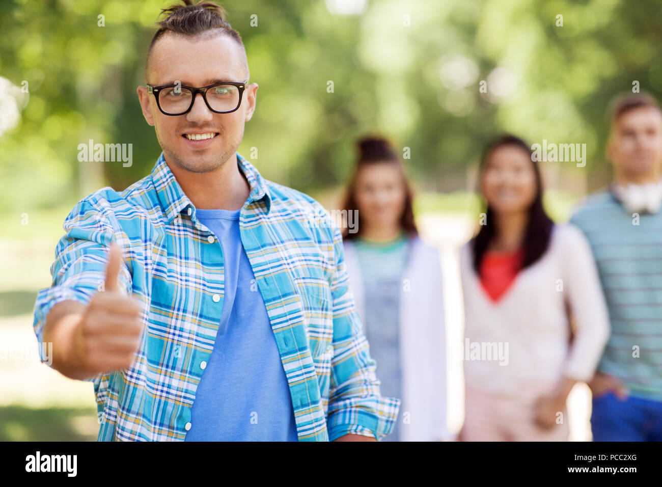 group of happy international friends outdoors Stock Photo - Alamy