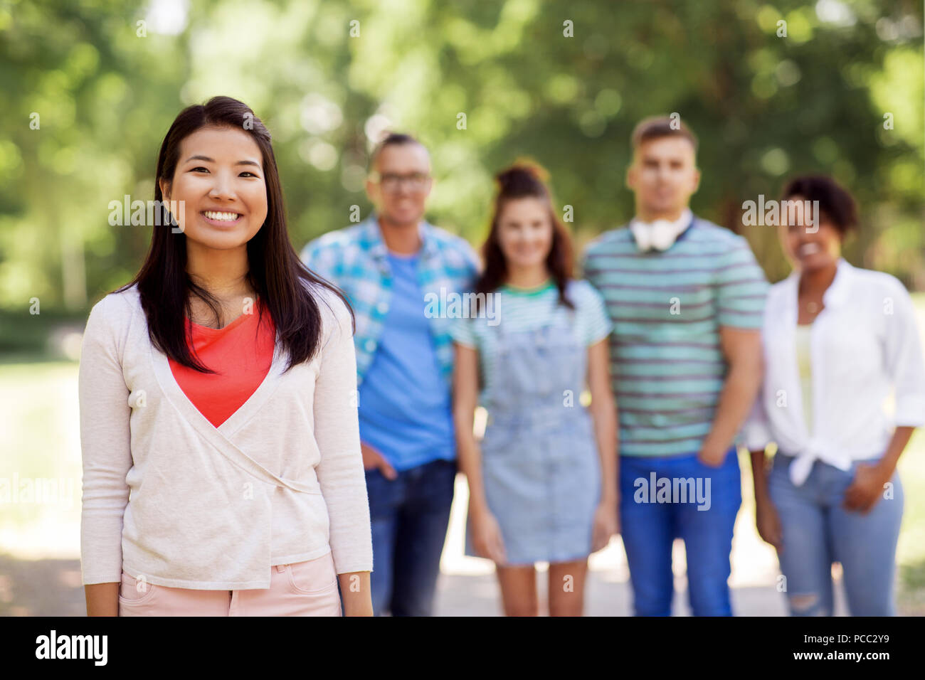 group of happy international friends outdoors Stock Photo - Alamy