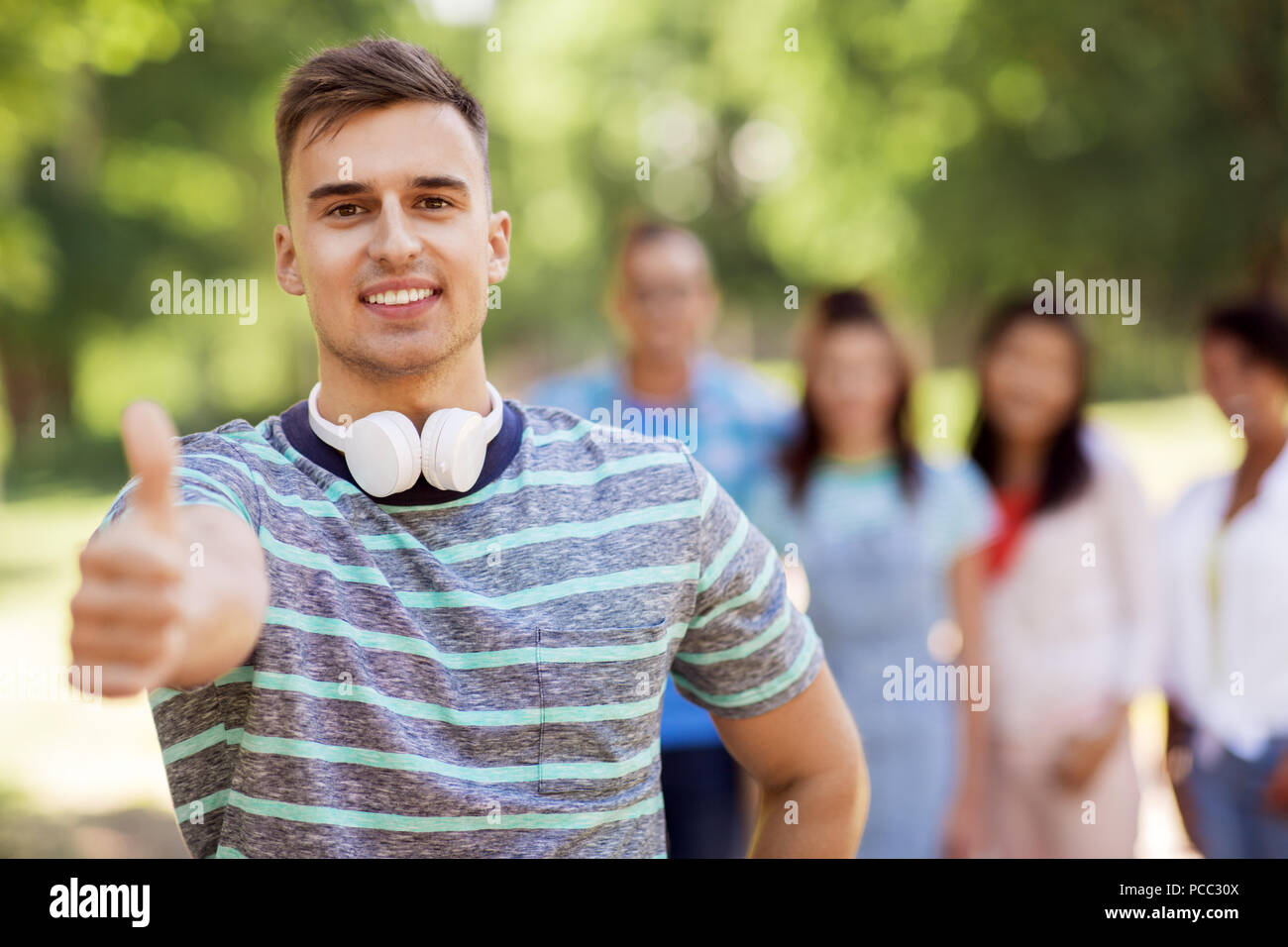 group of happy international friends outdoors Stock Photo - Alamy