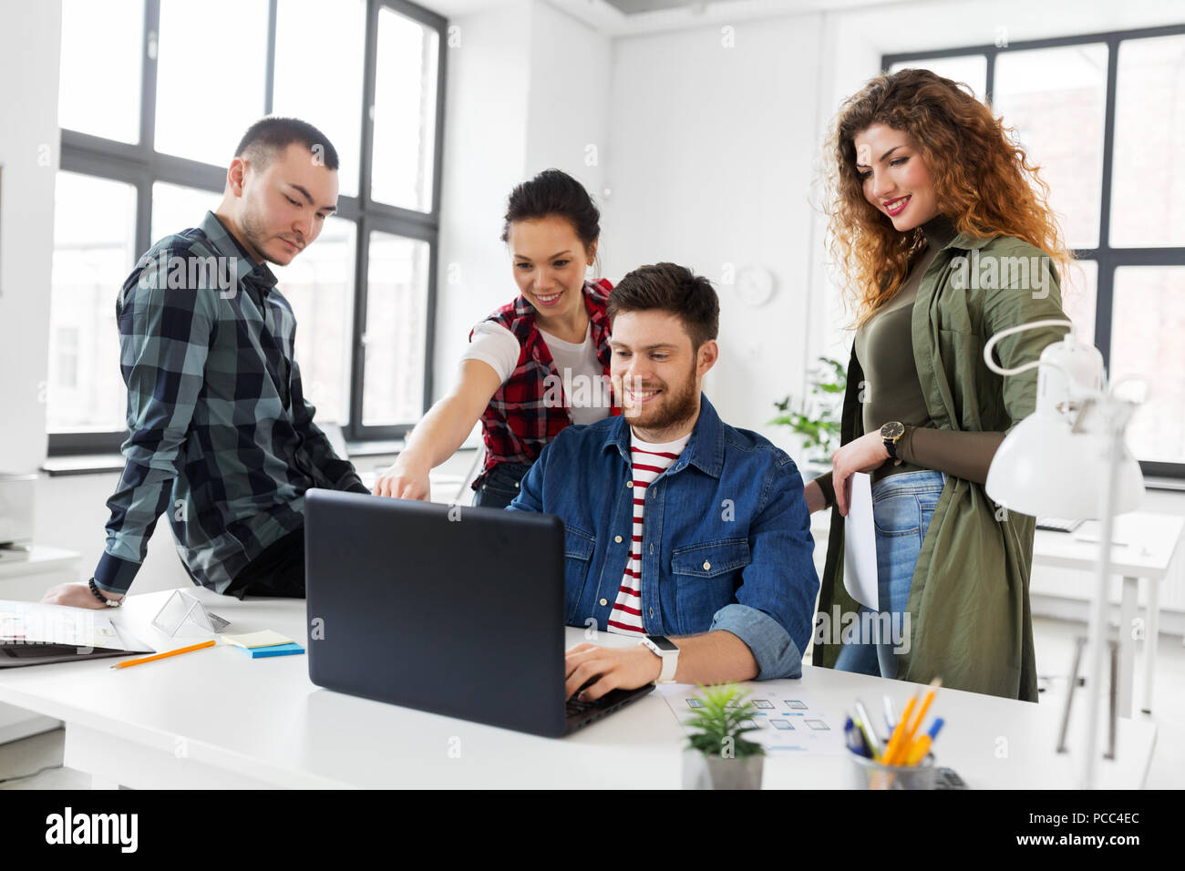 creative team working on user interface at office Stock Photo - Alamy