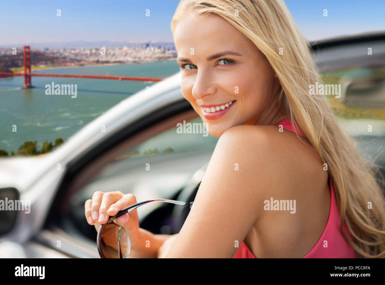 Woman driving car over bridge hi-res stock photography and images - Alamy