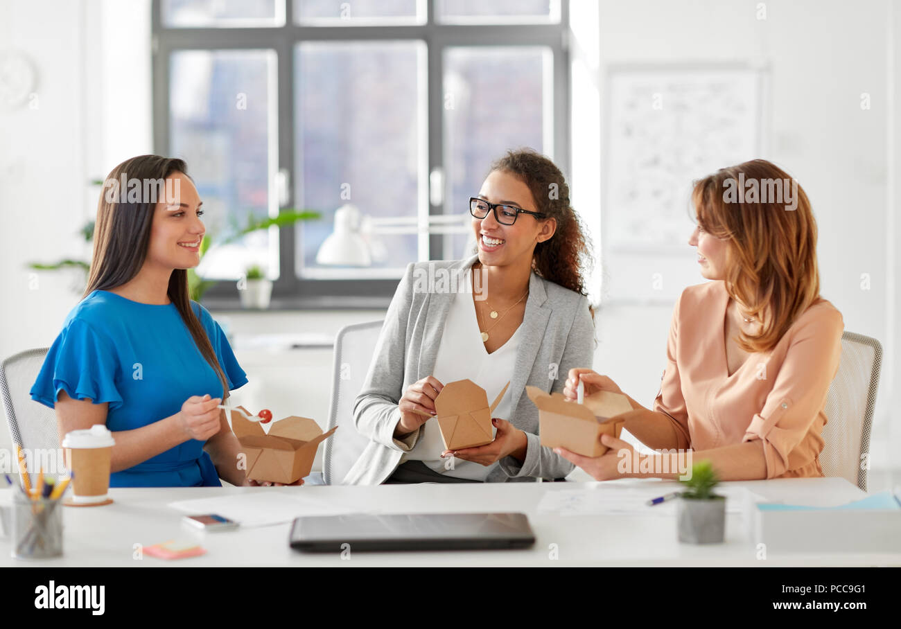 Woman eating take out food hi-res stock photography and images - Alamy