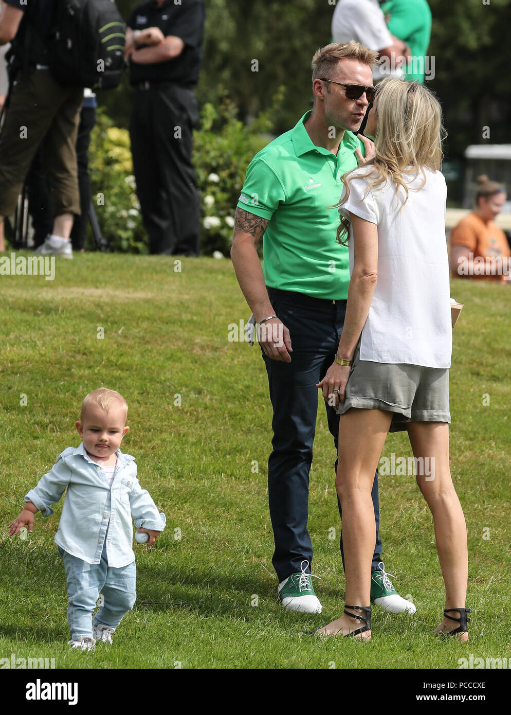 Ronan Keating plays in the Celebrity Cup, watched by his wife Storm and ...