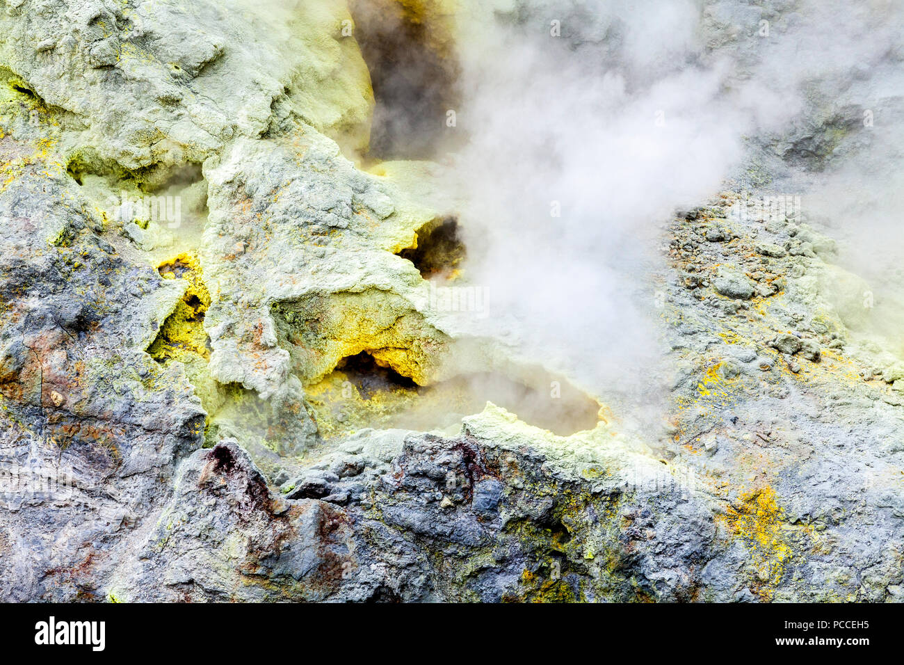 Steam, sulfuric, active fumaroles near the Mutnovsky volcano, Kamchatka ...