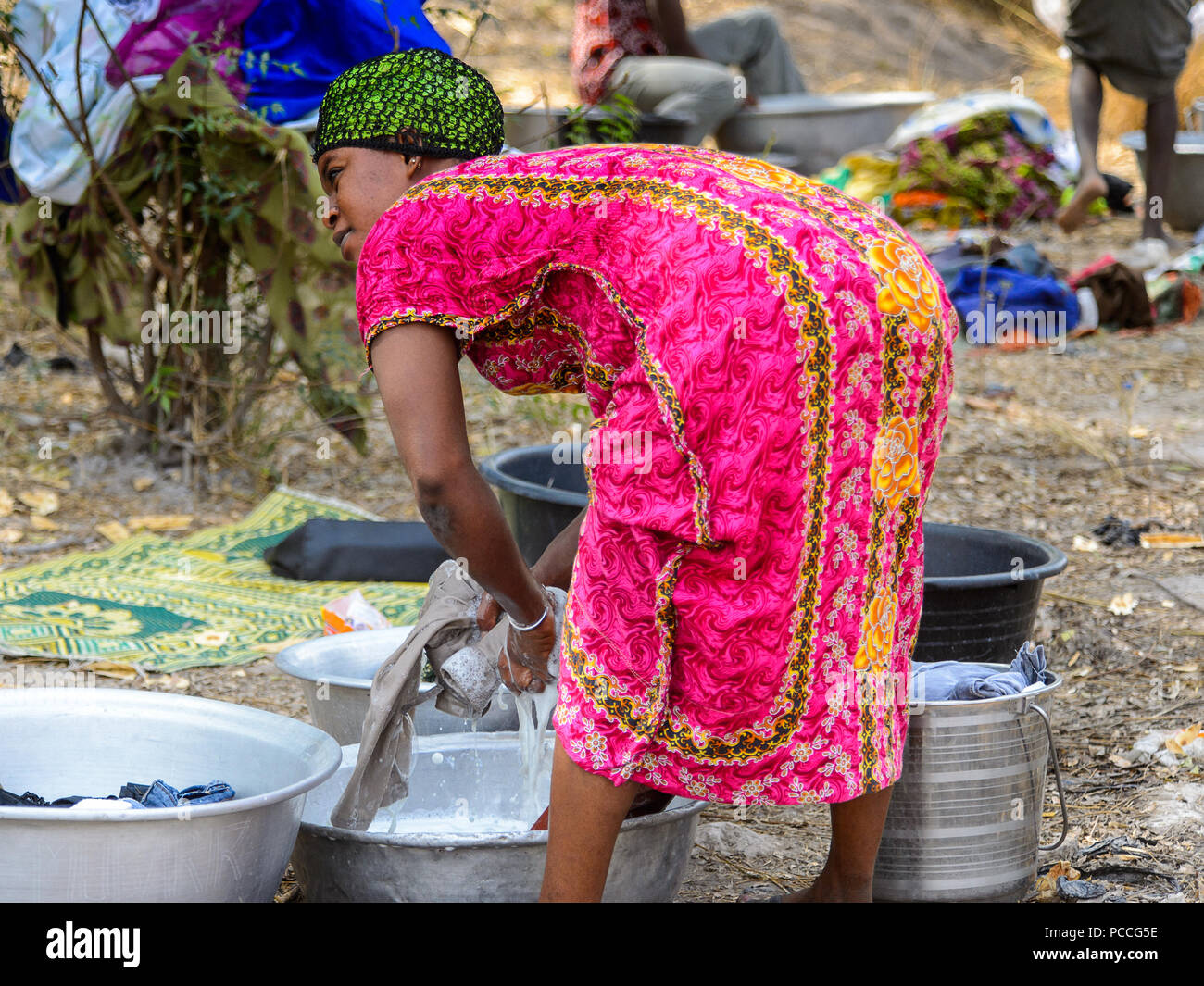 TECHIMAN, GHANA - JAN 15, 2017: Unidentified Ghanaian woman cleans ...