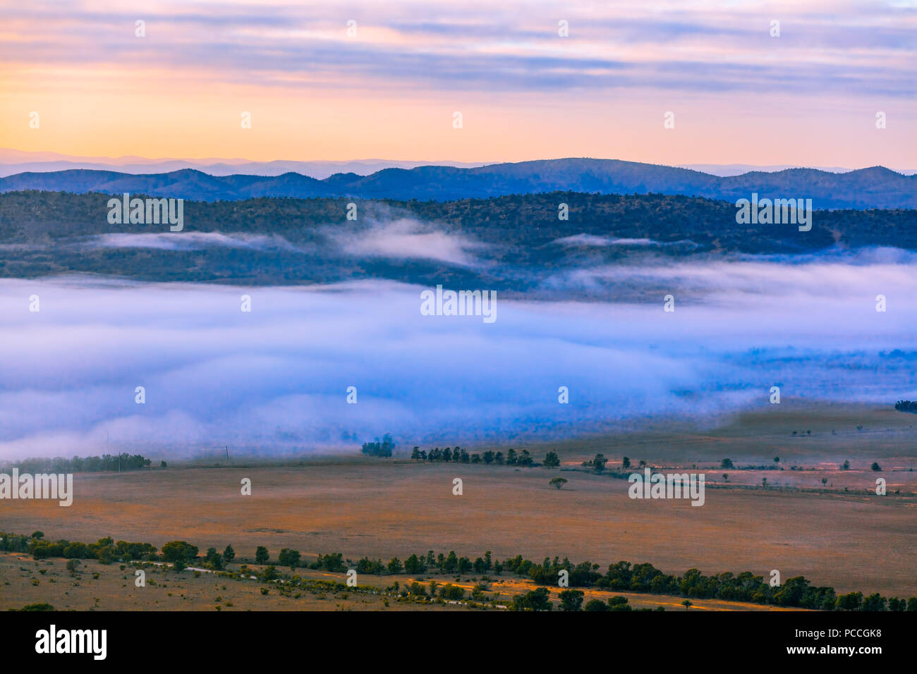 Mountainous landscape with low clouds on early morning Stock Photo - Alamy