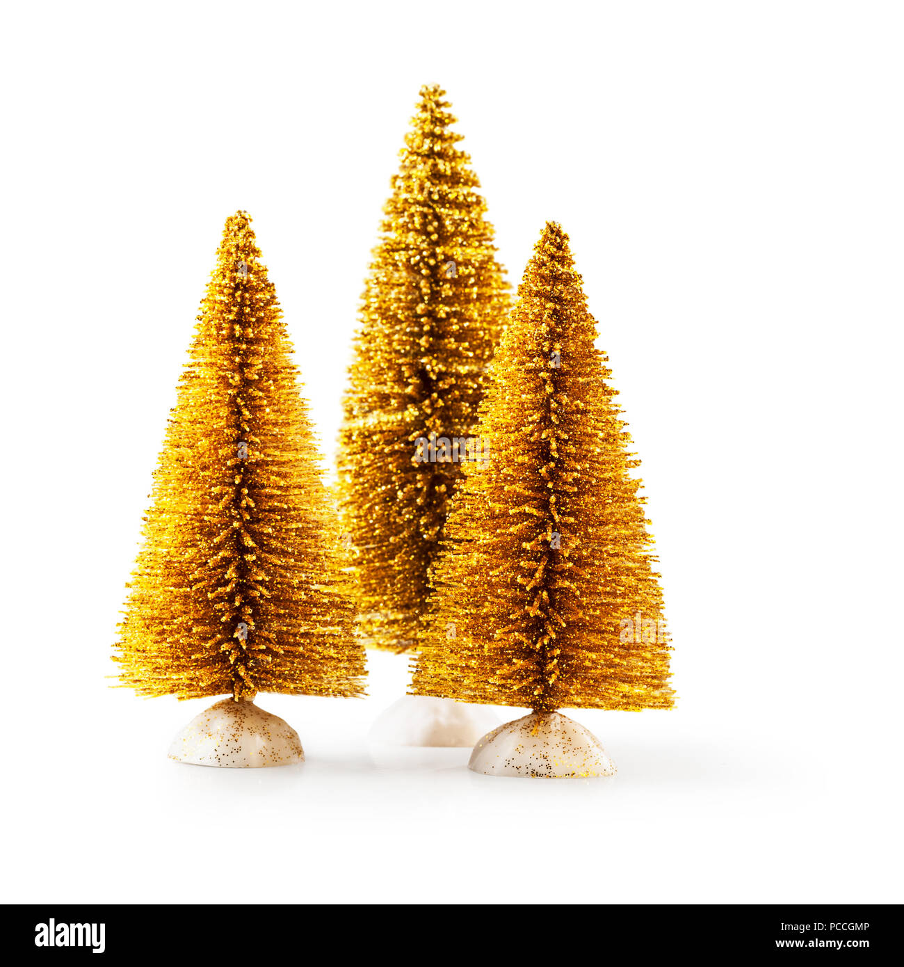 Group of golden christmas trees isolated on white background clipping ...