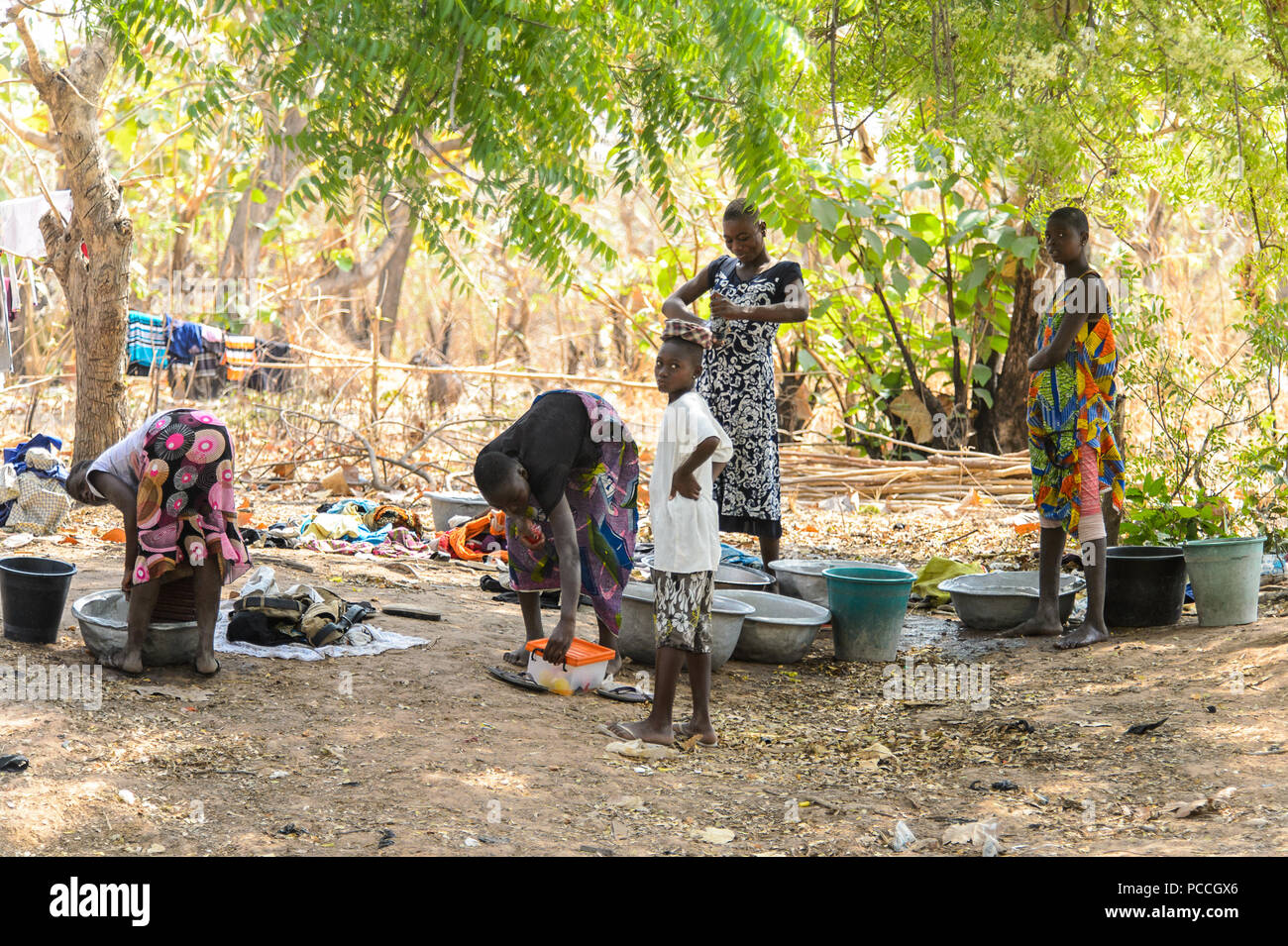 TECHIMAN, GHANA - JAN 15, 2017: Unidentified Ghanaian people clean the ...