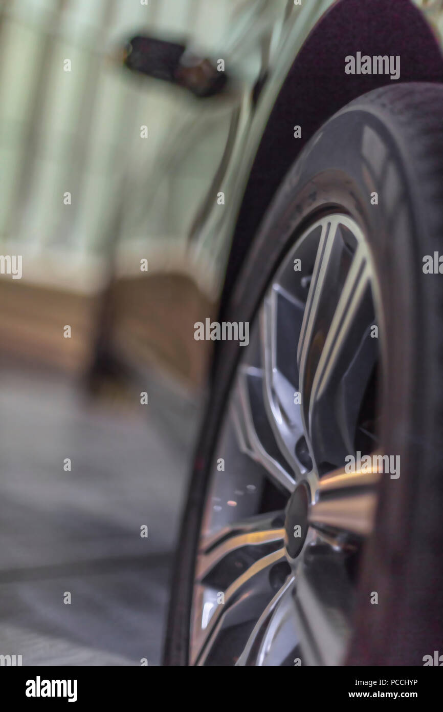 car wheel in detail with blurred background Stock Photo - Alamy