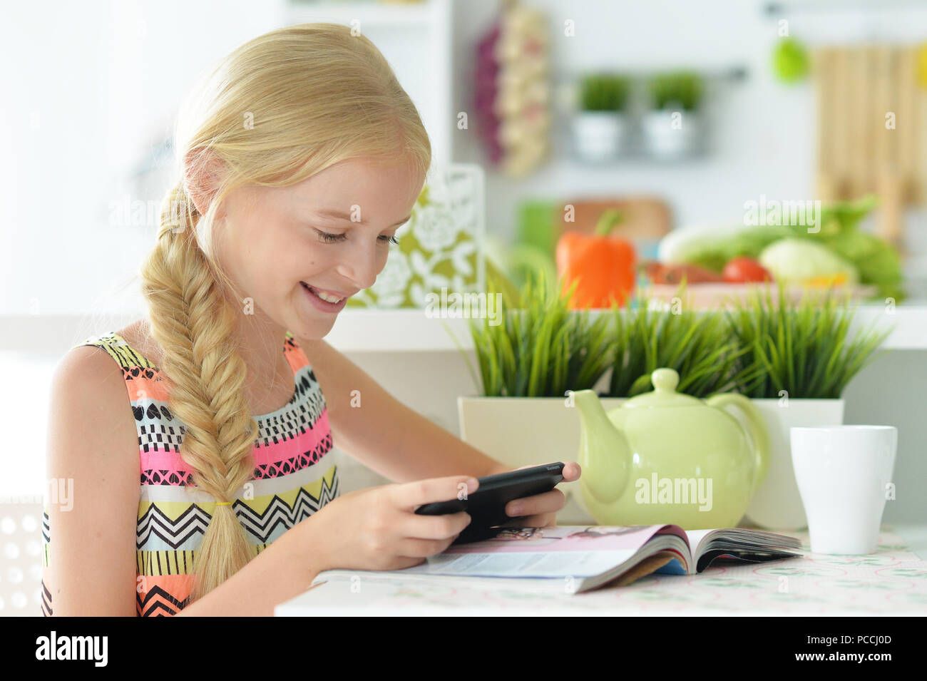 the girl in the kitchen Stock Photo - Alamy