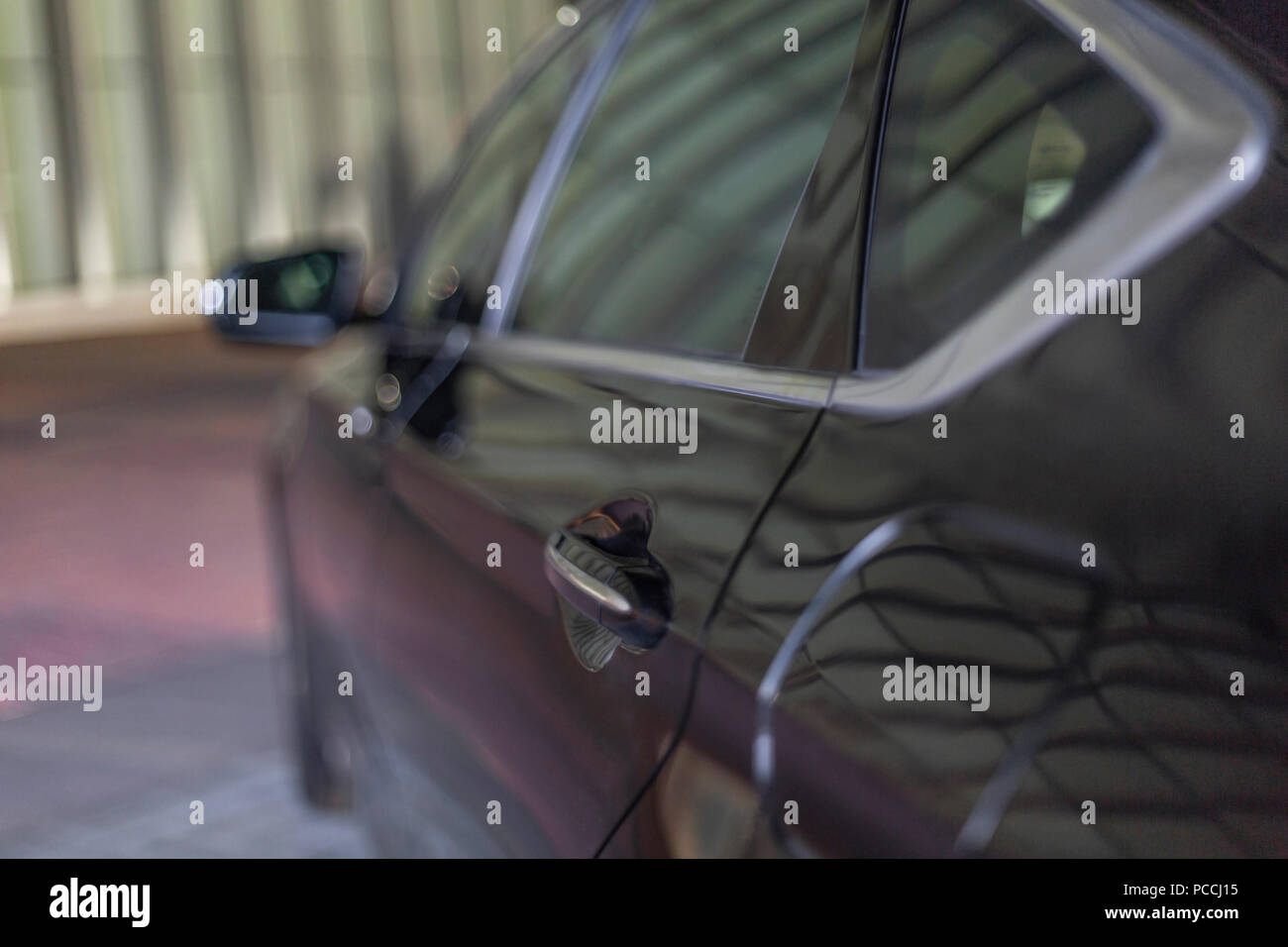 Detailed side view and close to a car, with blurred background Stock ...