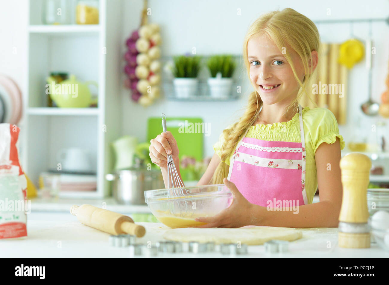 young girl in the kitchen Stock Photo - Alamy