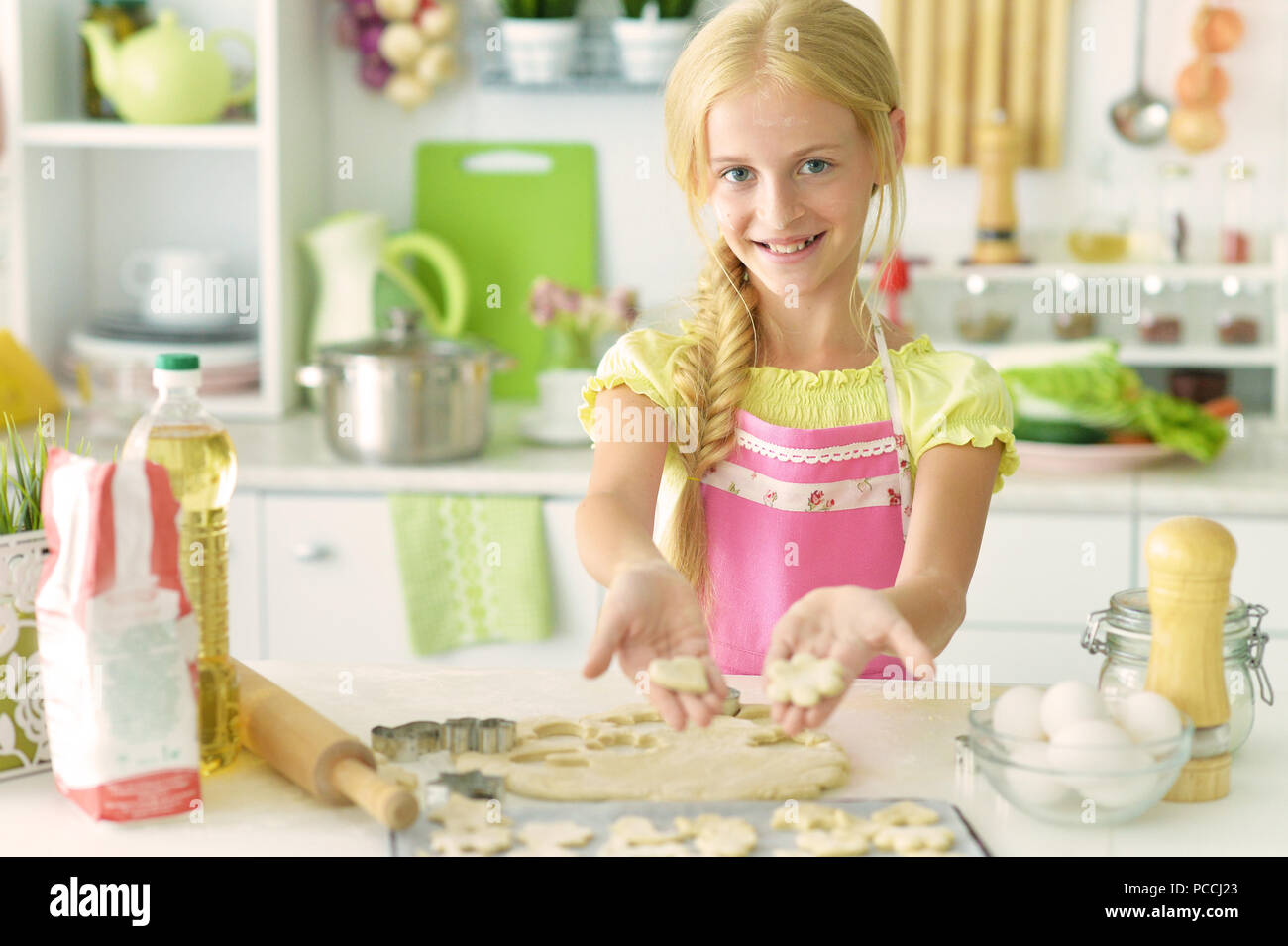 young girl in the kitchen Stock Photo - Alamy