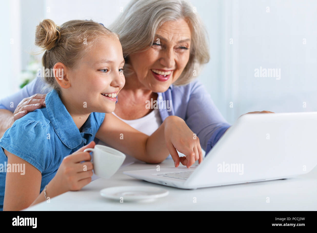 Grandmother with adorable granddaughter Stock Photo - Alamy