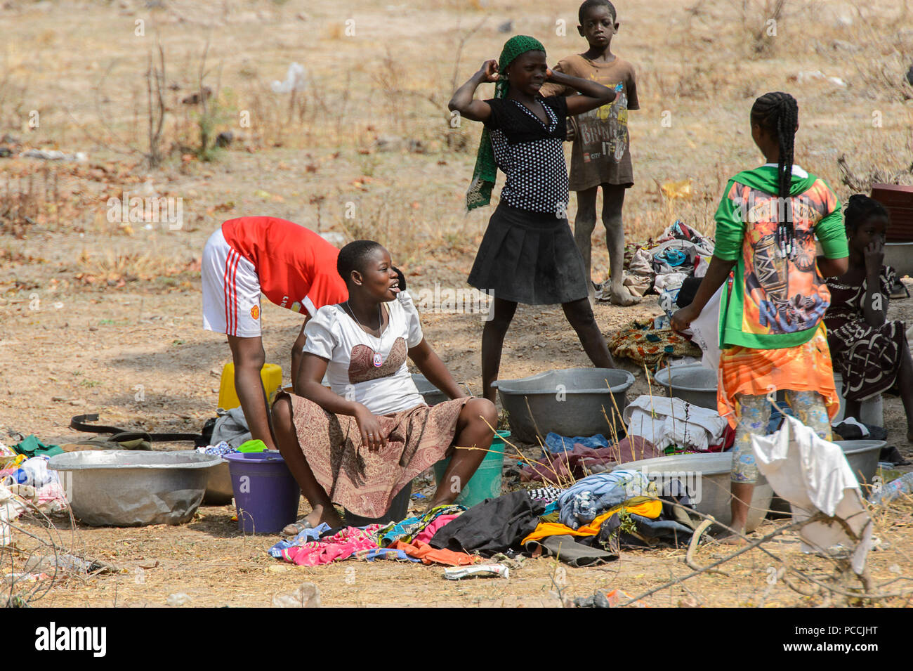 TECHIMAN, GHANA - JAN 15, 2017: Unidentified Ghanaian people clean the ...