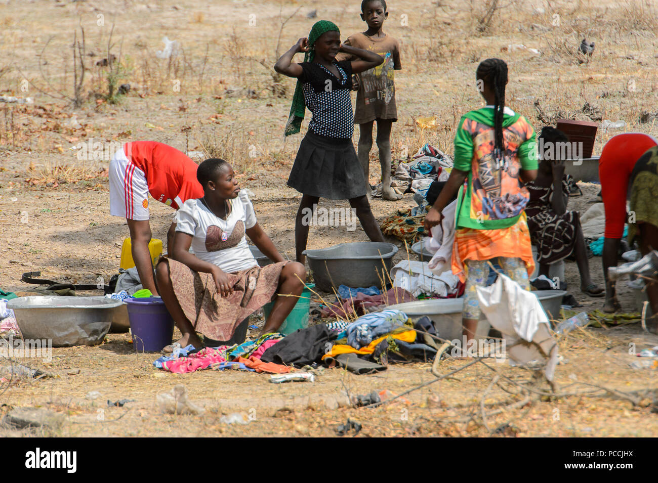 TECHIMAN, GHANA - JAN 15, 2017: Unidentified Ghanaian people clean the ...